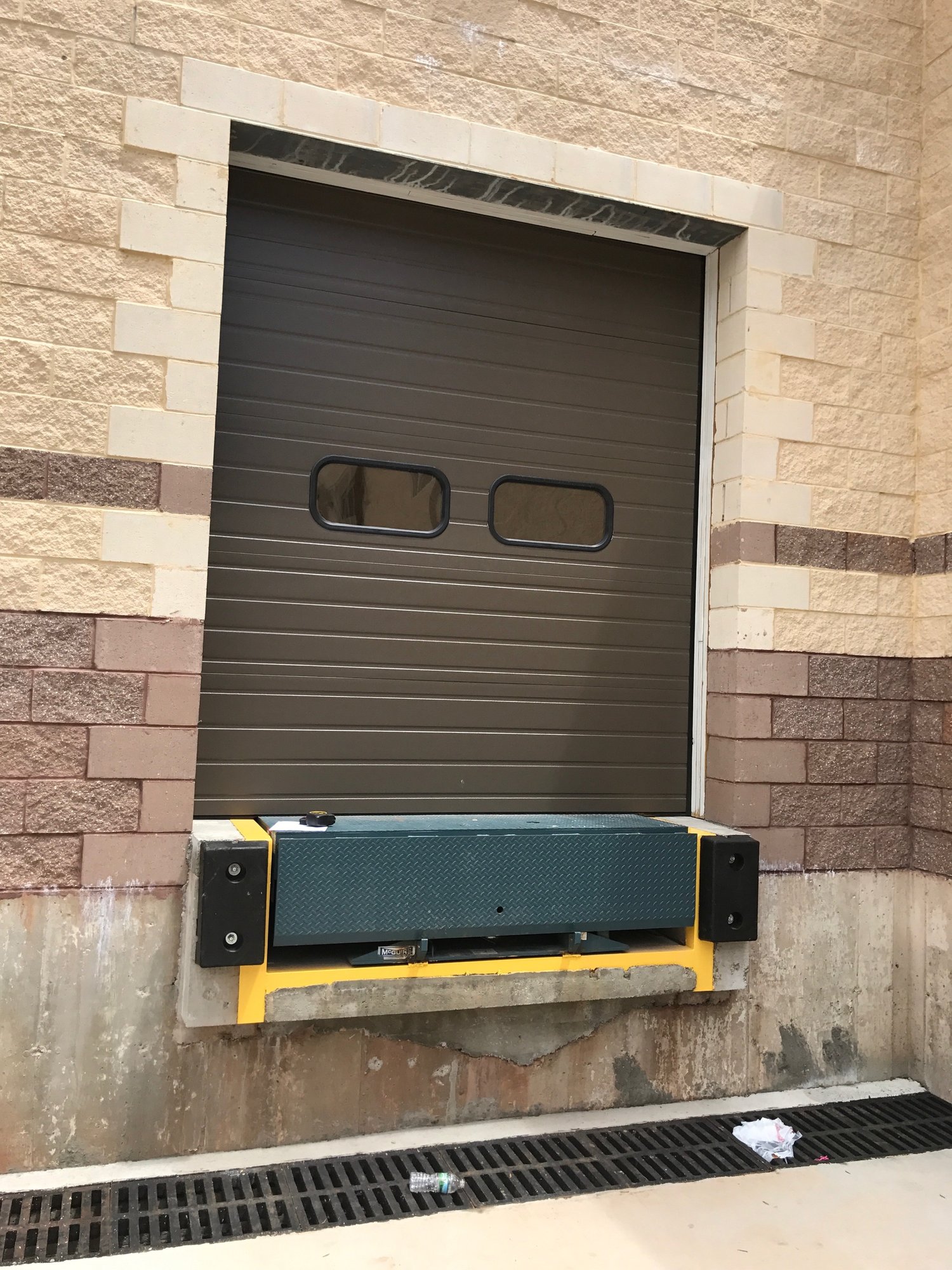 Extended Loading Dock Levelers & Tapered Dock Seals for Declining Driveways