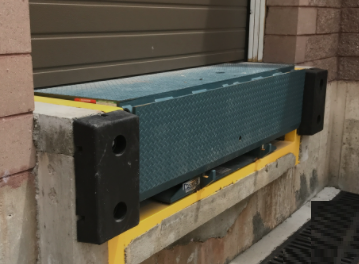 Extended Dock Levelers & Tapered Dock Seals for Declining Driveways